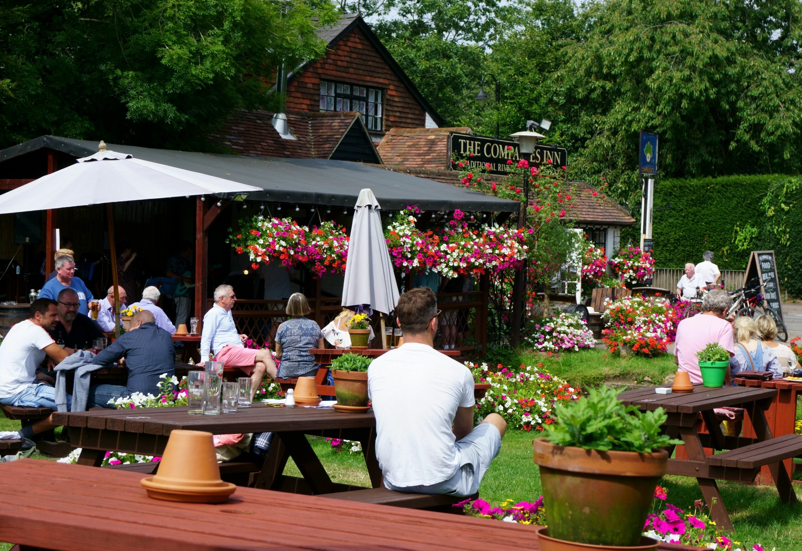 Brits are at their happiest when relaxing in a pub garden – Wokingham.Today